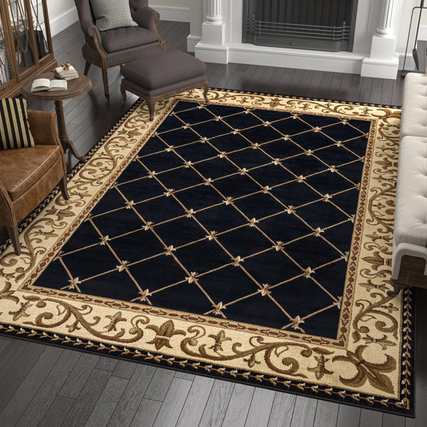 Astoria Grand Clarence Performance Black/Gold Rug & Reviews | Wayfair