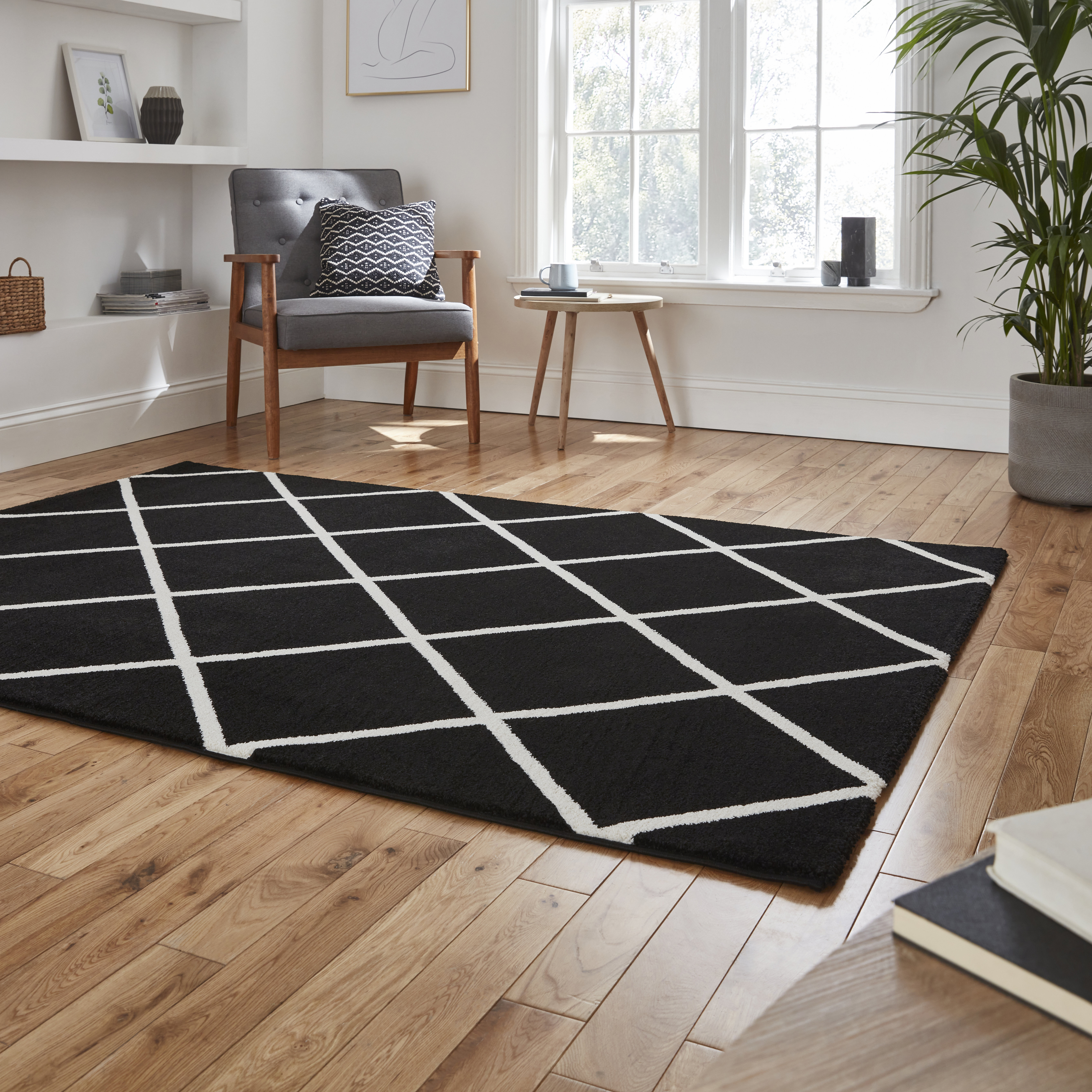Ebern Designs Fornof area rug Machine Woven Rectangle Black/White ...