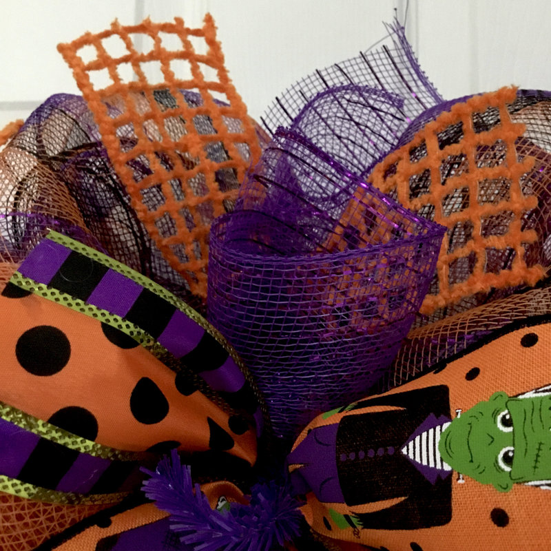 The Holiday Aisle® Happy Halloween Wreath with Monster | Wayfair