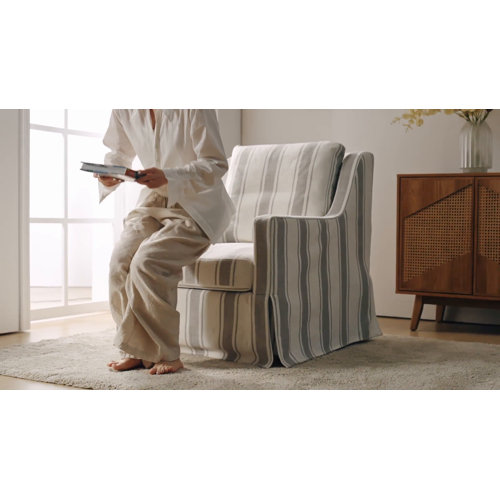 Ebern Designs Eadyn Slipcover Swivel Rocking Chair with Pillow Back ...