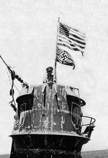 Buyenlarge Old Glory Flies over the U-505 Photographic Print | Wayfair