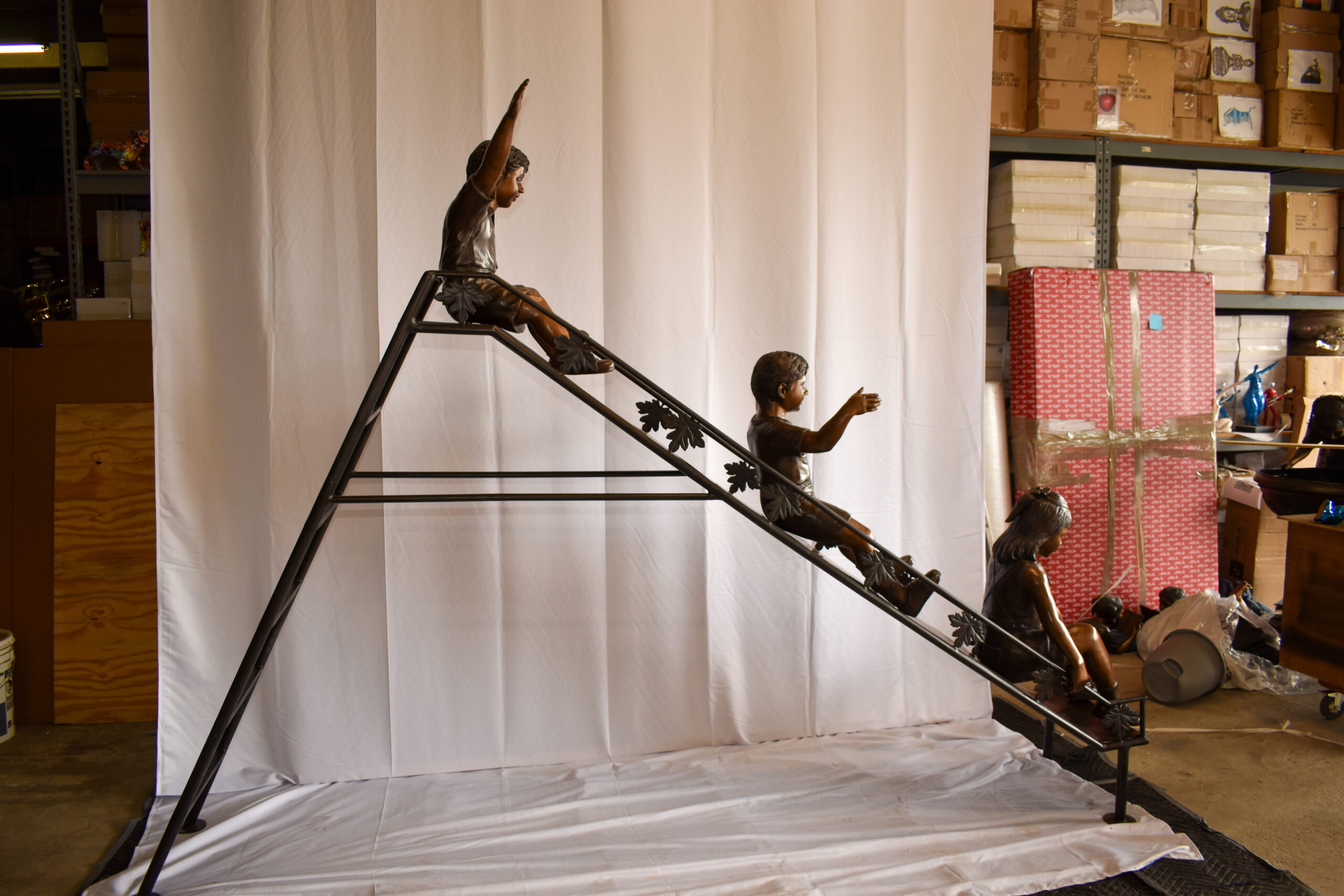 Nifao Collection Lifsize Three kids playing on a slide bronze sculpture ...