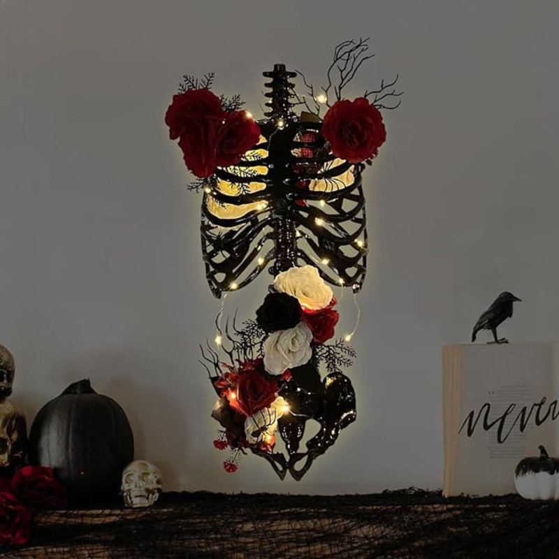 The Holiday Aisle® Halloween Floral Skeleton Torso Decor. | Wayfair