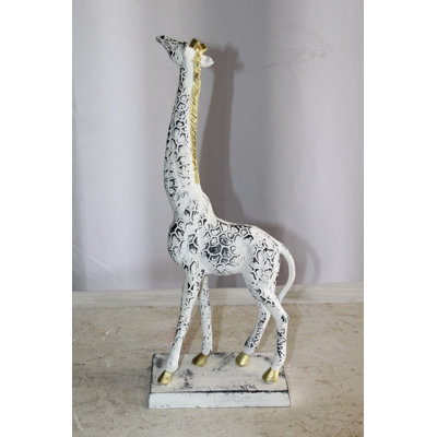 white giraffe statue