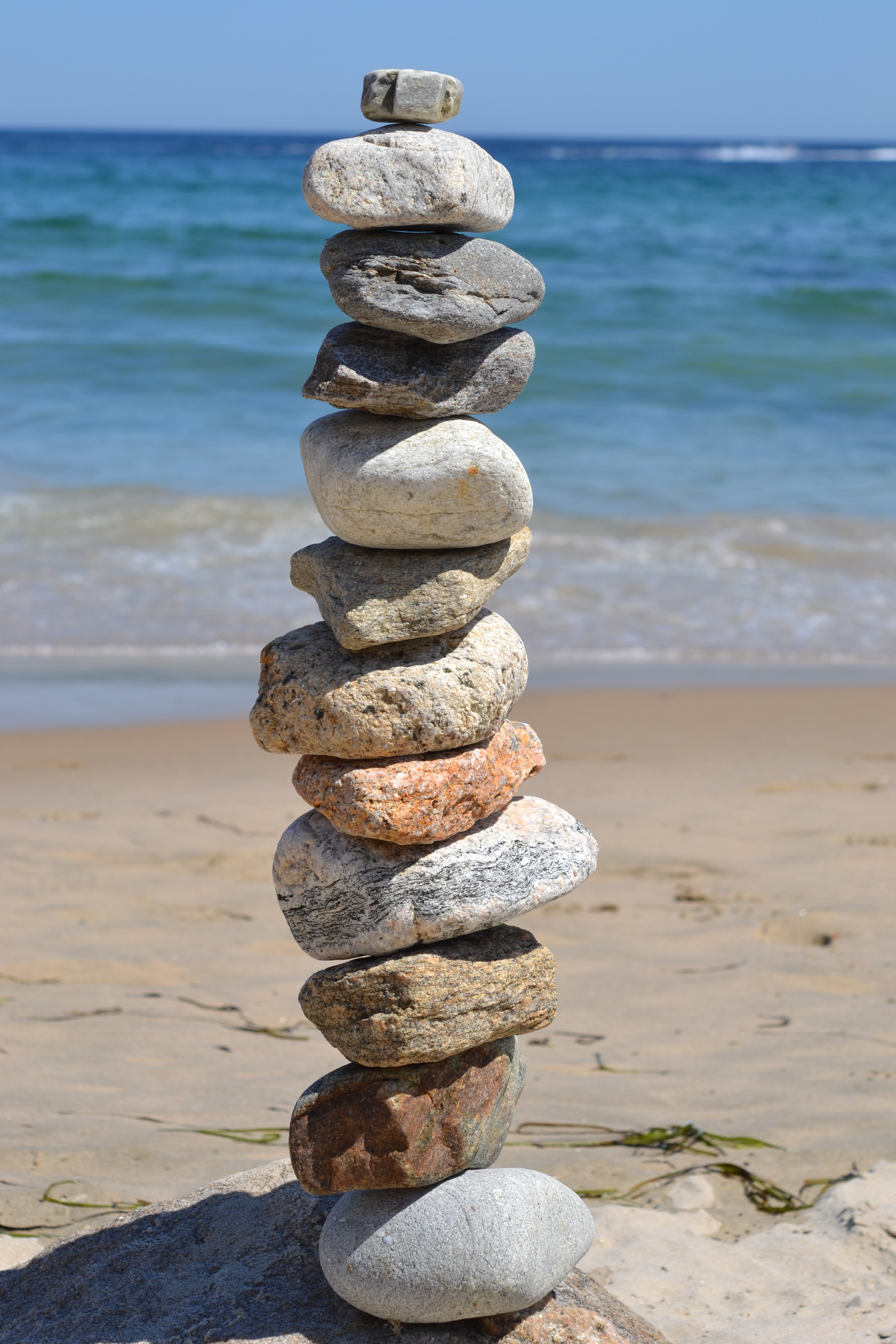 Highland Dunes Rock Balance on Beach by EpicStockMedia - Wrapped Canvas ...