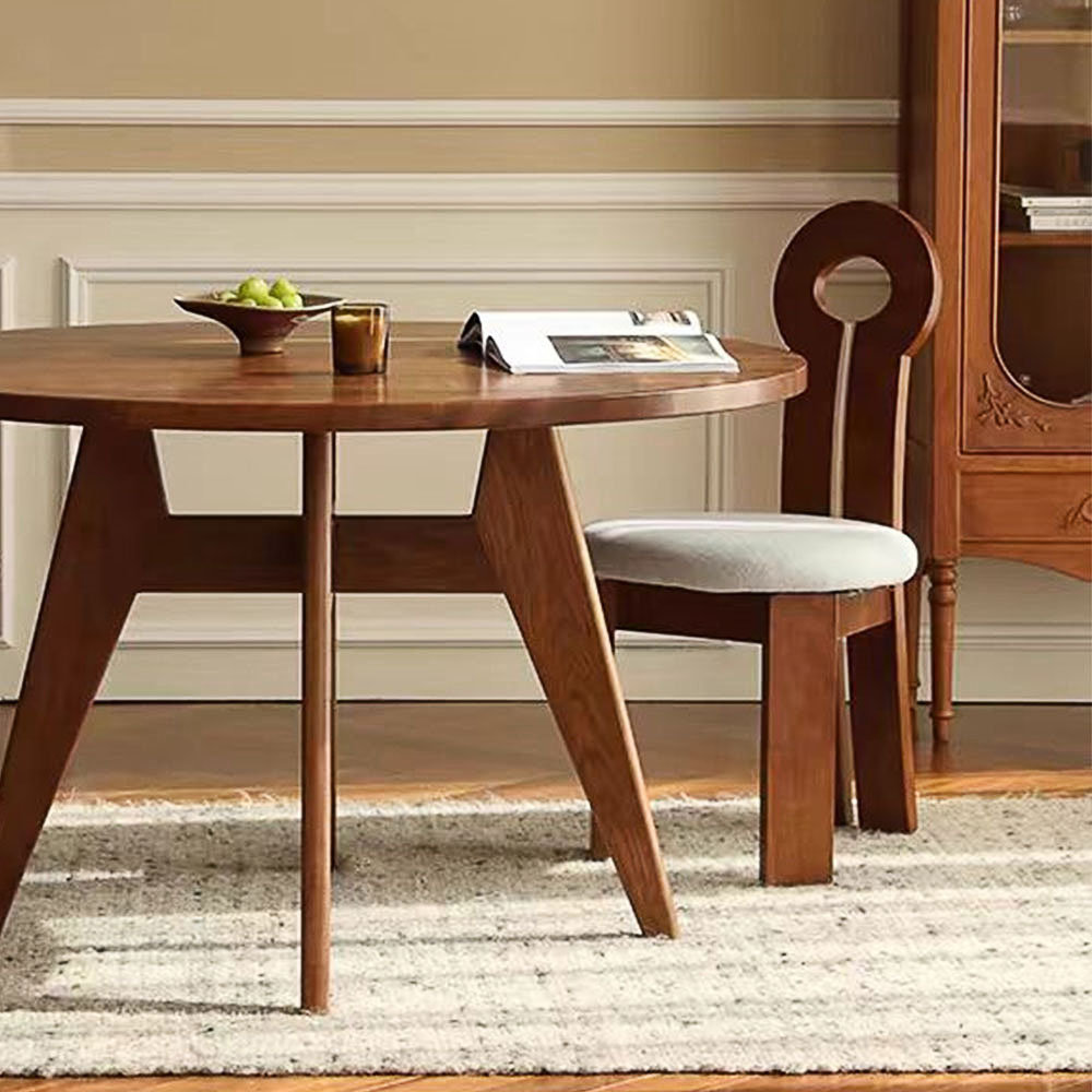 A Bestiary Living Ancient style round solid wood dining table | Wayfair