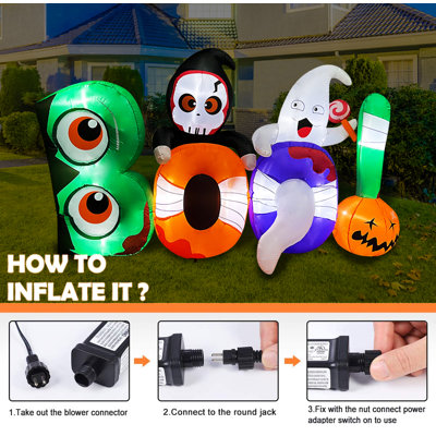 The Holiday Aisle® Halloween Boo with Skeleton Inflatable Set | Wayfair