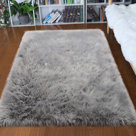 Everly Quinn Macie-Rose Faux Sheepskin Solid Color Rug & Reviews | Wayfair