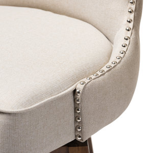 Three Posts™ Wadley Swivel Upholstered 30.51'' Counter Stool with Solid ...