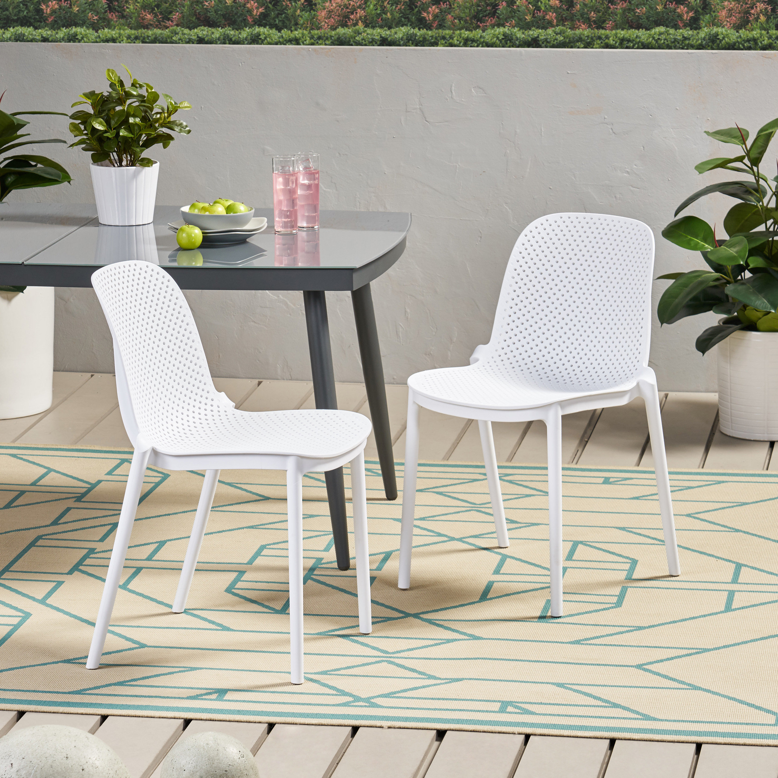 Ivy Bronx Modern Outdoor Plastic Chairs with Perforated Backrest ...