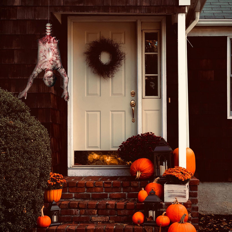 The Holiday Aisle® Niland Halloween Prop Severed Skinned Hanging Torso ...