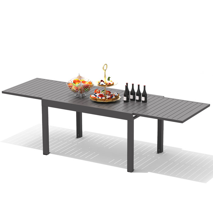 Ebern Designs Domi Extendable Aluminum Dining Table & Reviews | Wayfair