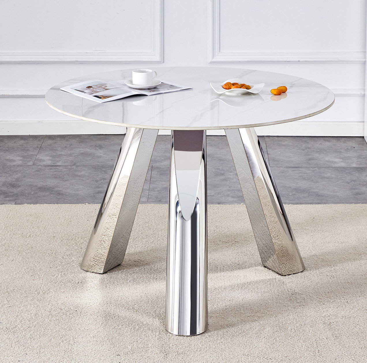 Brayden Studio® A 42-inch burn stone round table with stainless steel ...