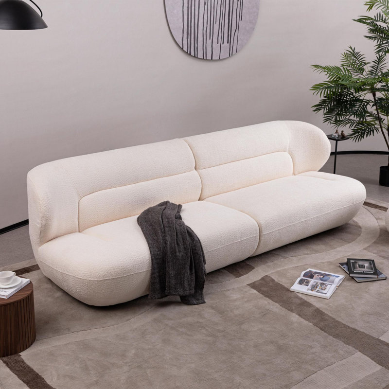 Orren Ellis Upholstered sofa with Circular curve | Wayfair