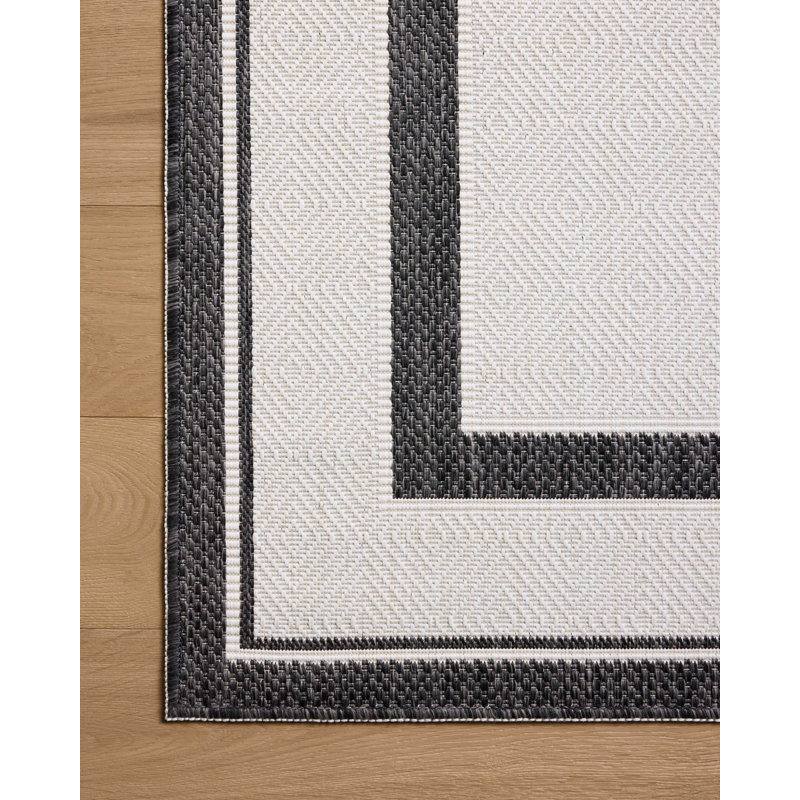 Ebern Designs Badgery Onyx / Ivory Reversible Indoor / Outdoor Area Rug ...