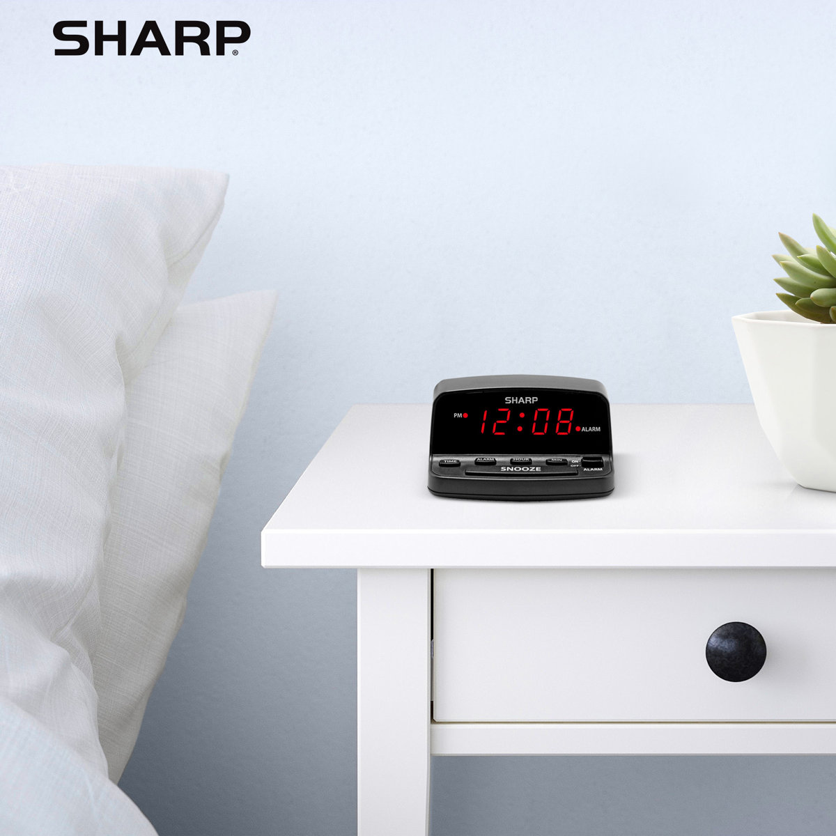 Sharp Digital Alarm Clock with Keyboard Style Controls | Wayfair