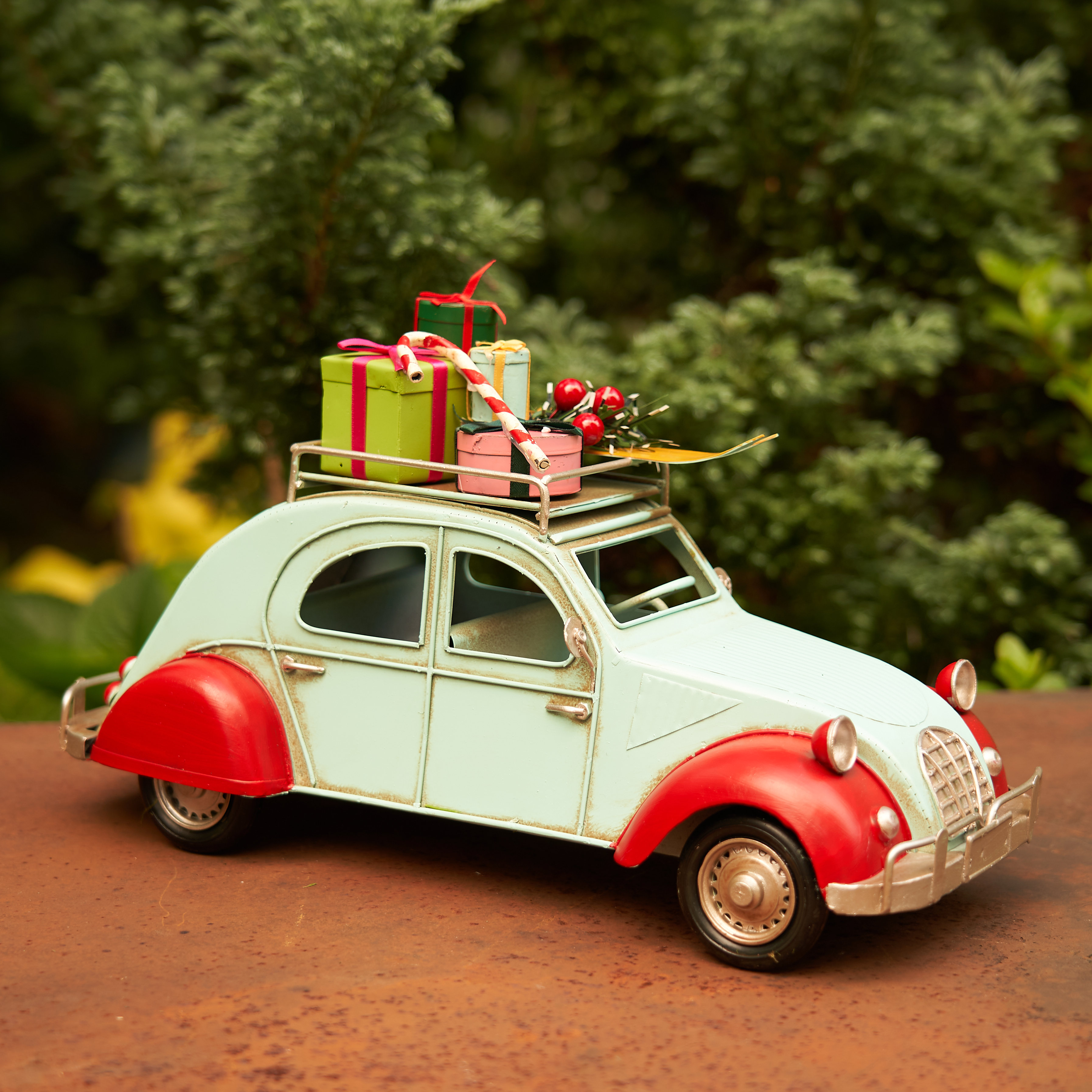 The Holiday Aisle® 14" Red & Blue Buggy with Christmas Gifts | Wayfair
