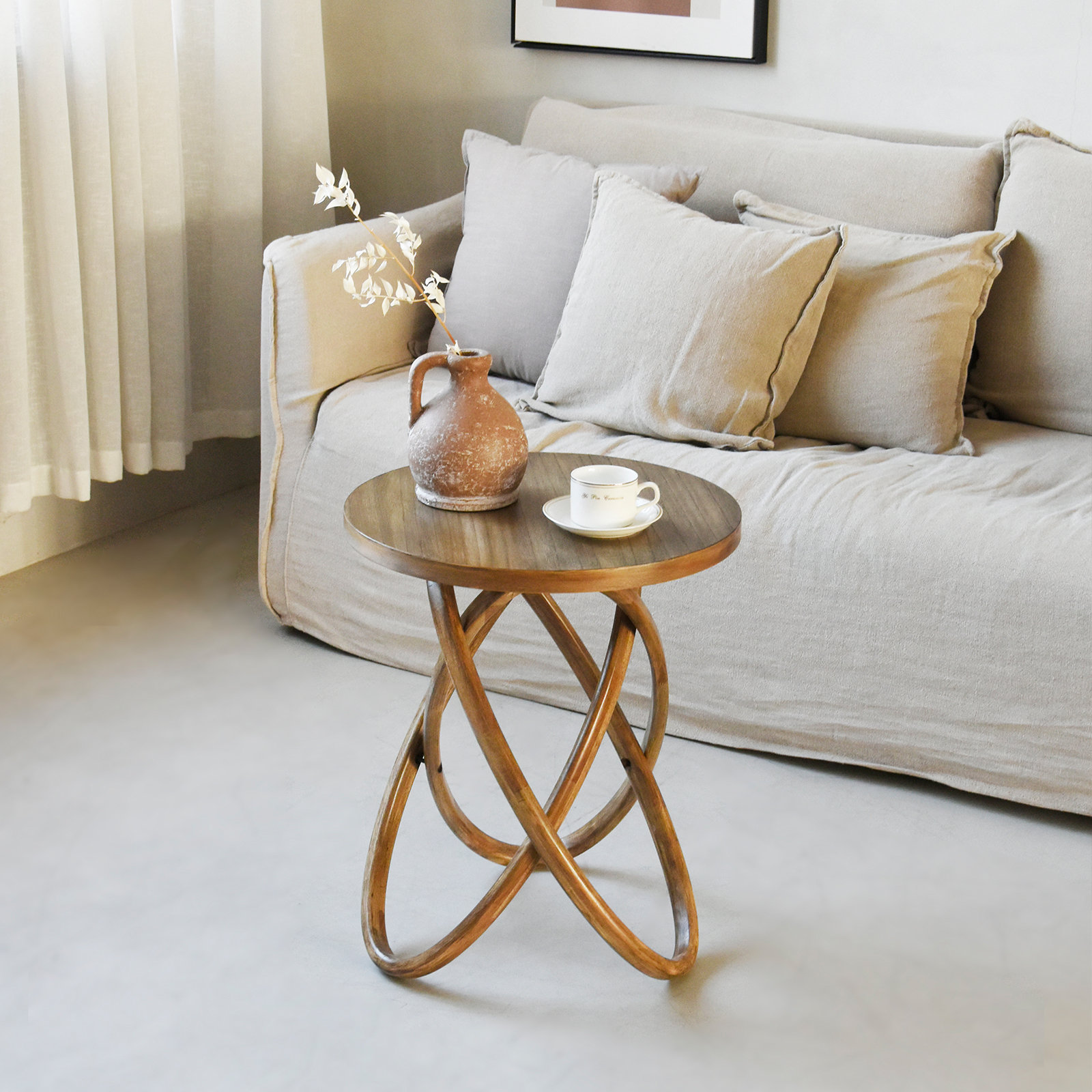 17 Stories This round coffee table is handmade from solid oak wood. It ...