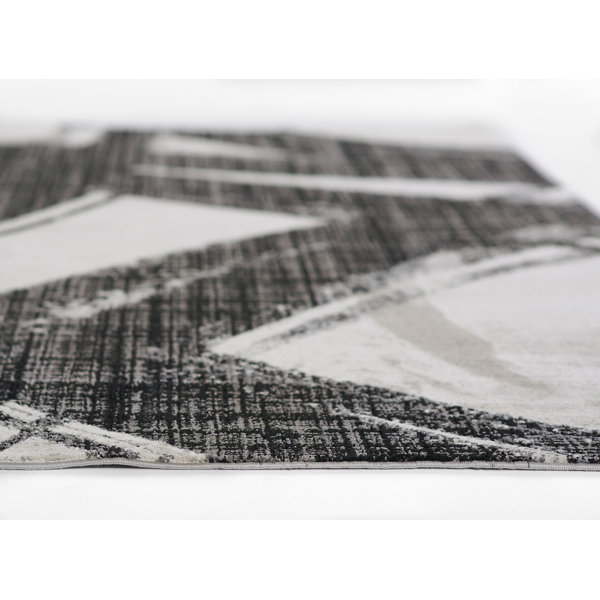 Ebern Designs Avyaan Abstract Ivory/Black Area Rug & Reviews | Wayfair