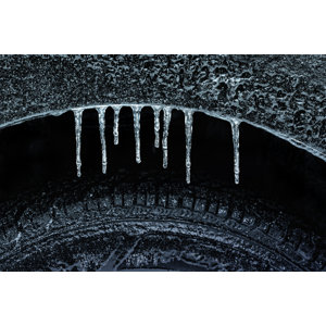Ebern Designs Frozen Wheel Well and Tire - Photograph on Canvas | Wayfair