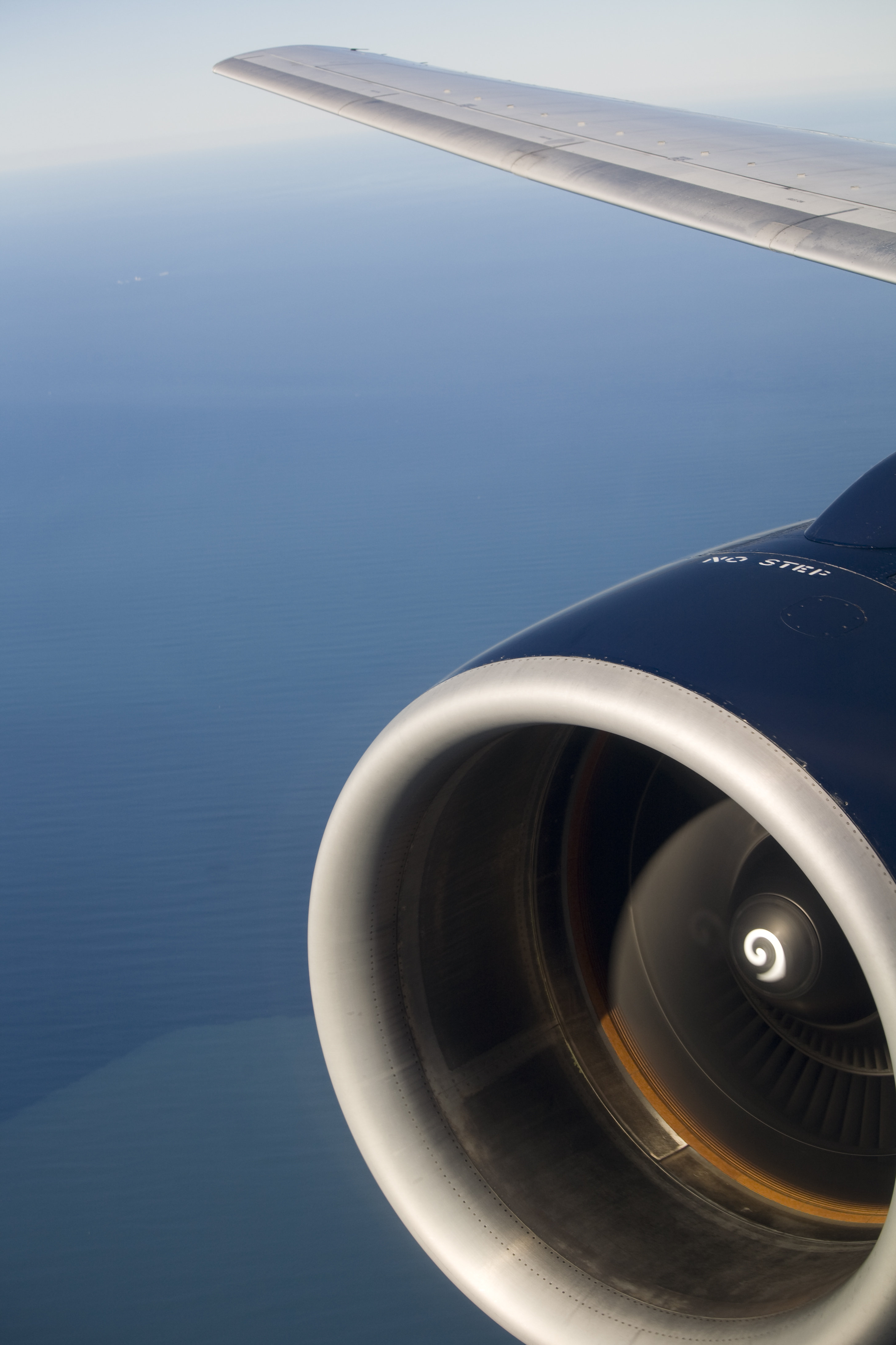 Ebern Designs Airplane Engine, Wing Flying Over Water by Carterdayne ...