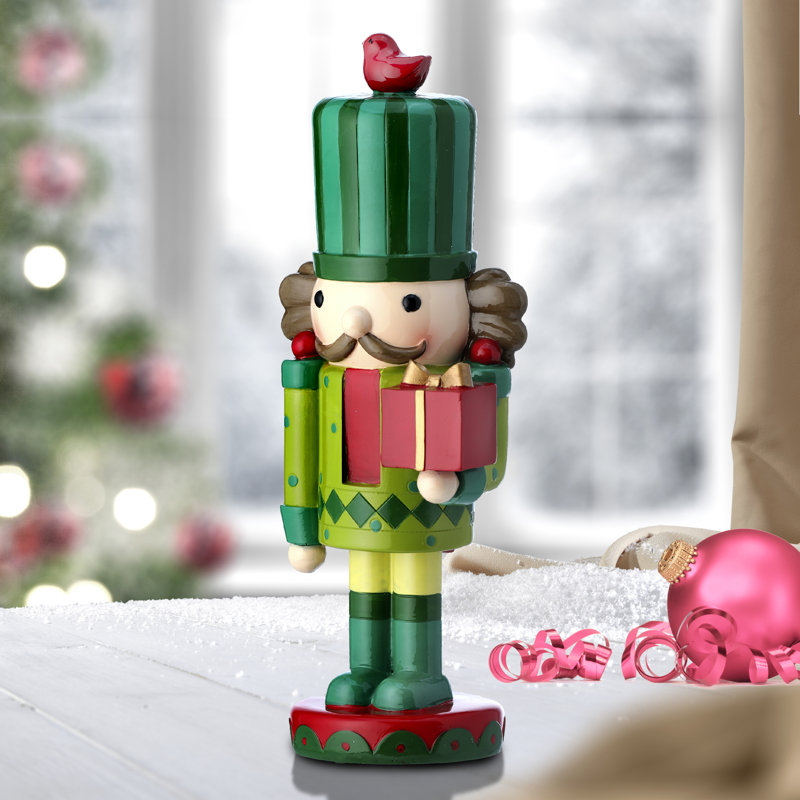 The Holiday Aisle® 12" Resin Nutcracker With Package | Wayfair
