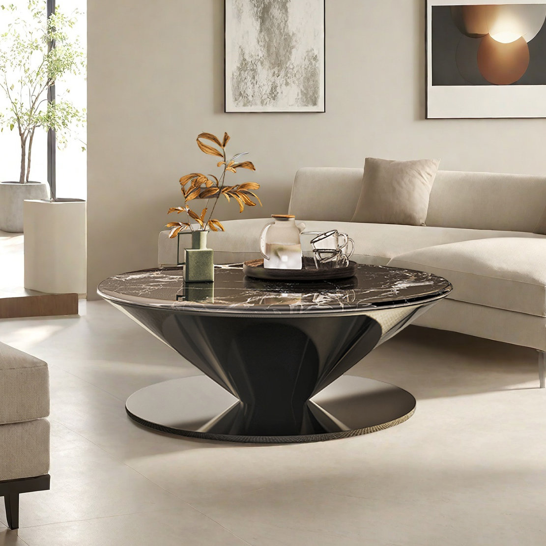 Orren Ellis Marble flying saucer round coffee table | Wayfair