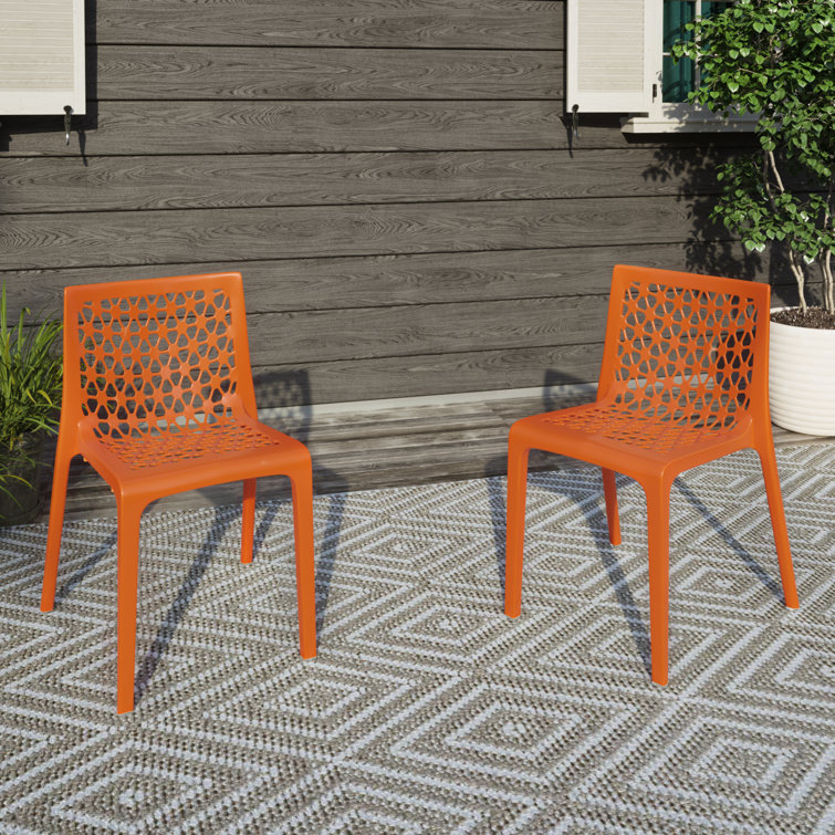 Ebern Designs Outdoor Stacking Dining Side Chair & Reviews | Wayfair