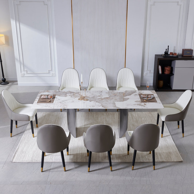 Orren Ellis Keeli Extendable Sintered Stone Dining Table with 8 Leather ...
