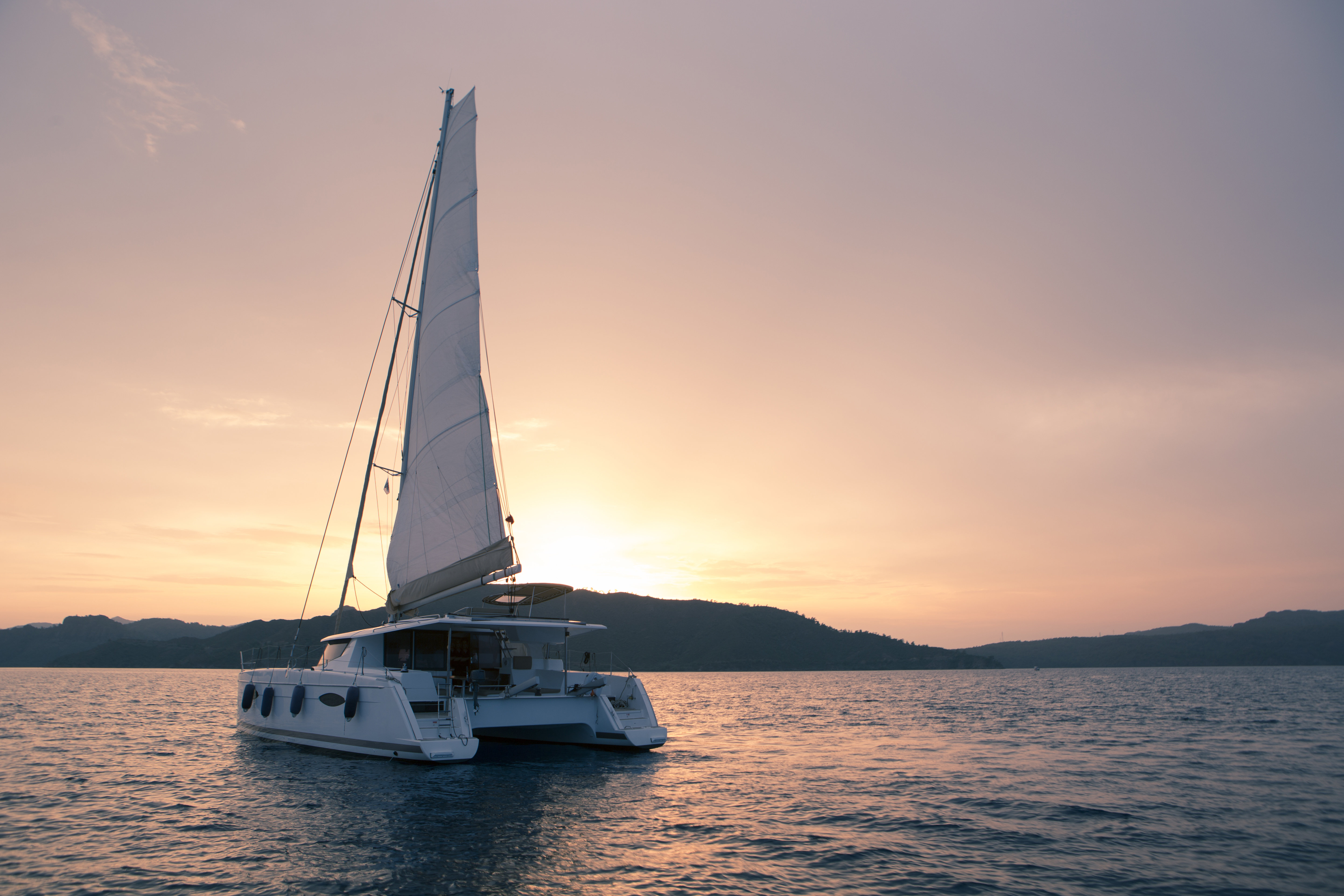 Breakwater Bay Yacht - Catamaran in Ocean by Sarmdy - Wrapped Canvas ...
