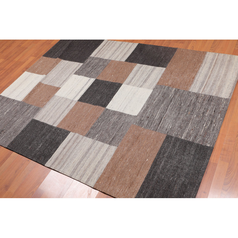 Orren Ellis Pana Handmade Flatweave Wool Earth Tones Rug | Wayfair