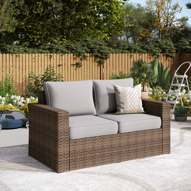 Wade Logan® Ingle Wicker Outdoor Ottoman with Sunbrella® Cushion ...