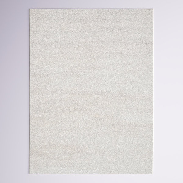 Wade Logan® Autin Solid Color Machine Woven Polyester Area Rug in Ivory ...