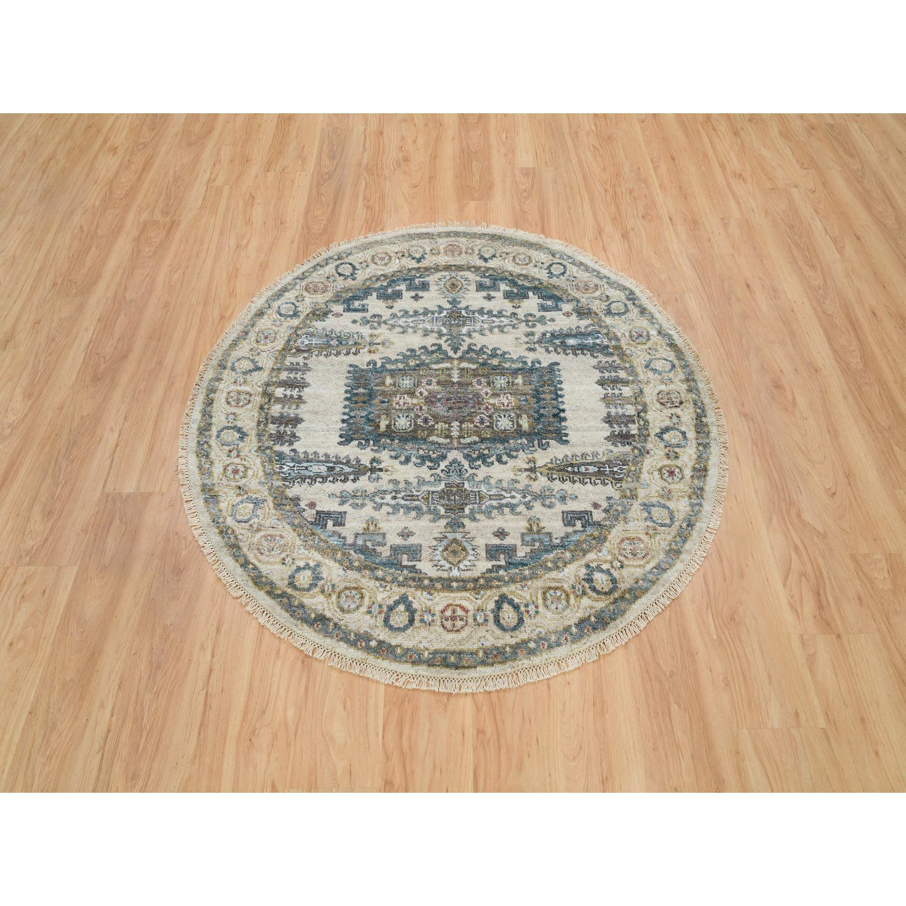 Isabelline Round Teymur Round 5' Wool Area Rug | Wayfair