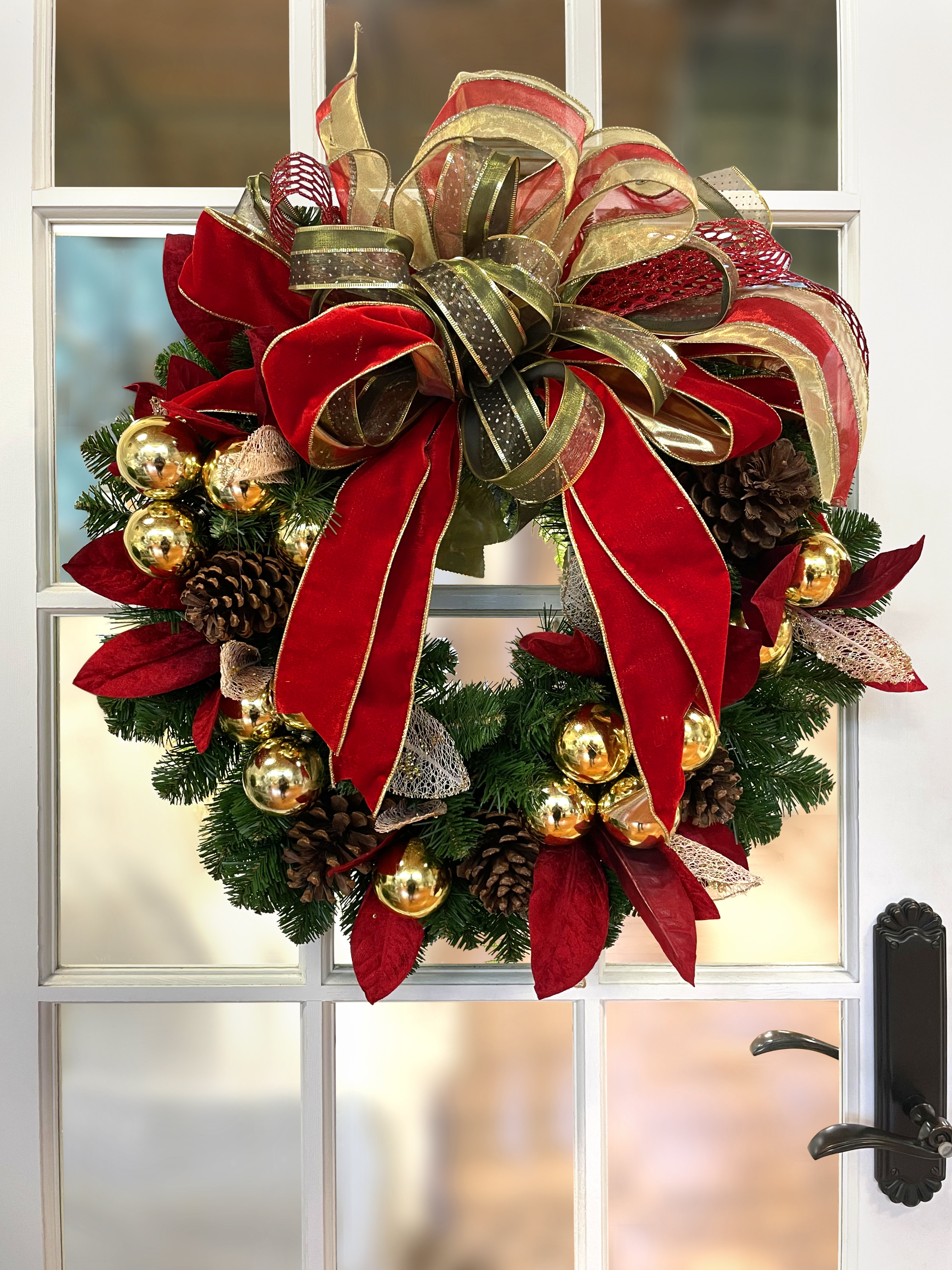 The Holiday Aisle® 26'' Holiday Wreath Arranged with Bows, Ornaments ...