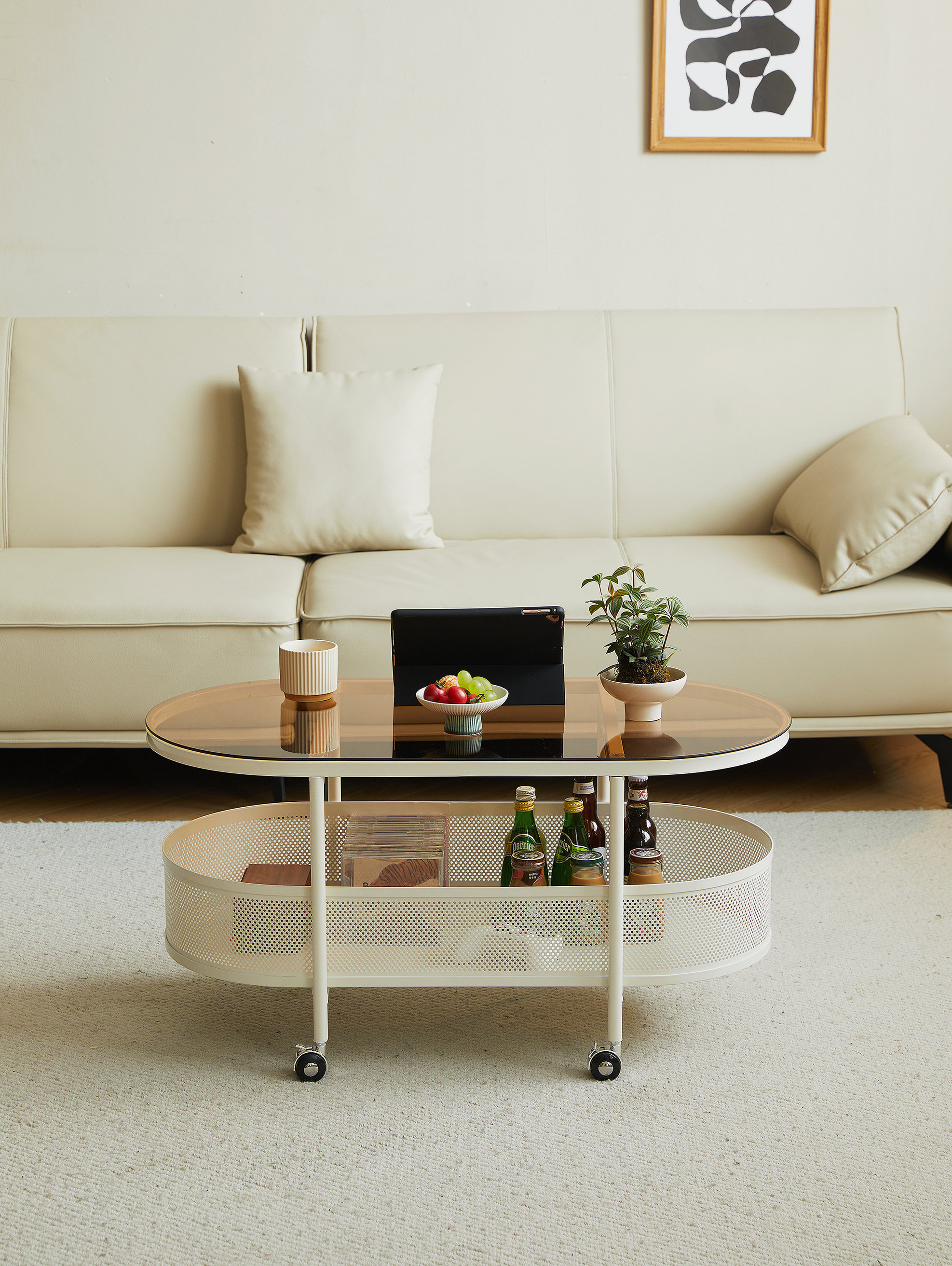Latitude Run® Movable oval metal glass coffee table with storage | Wayfair