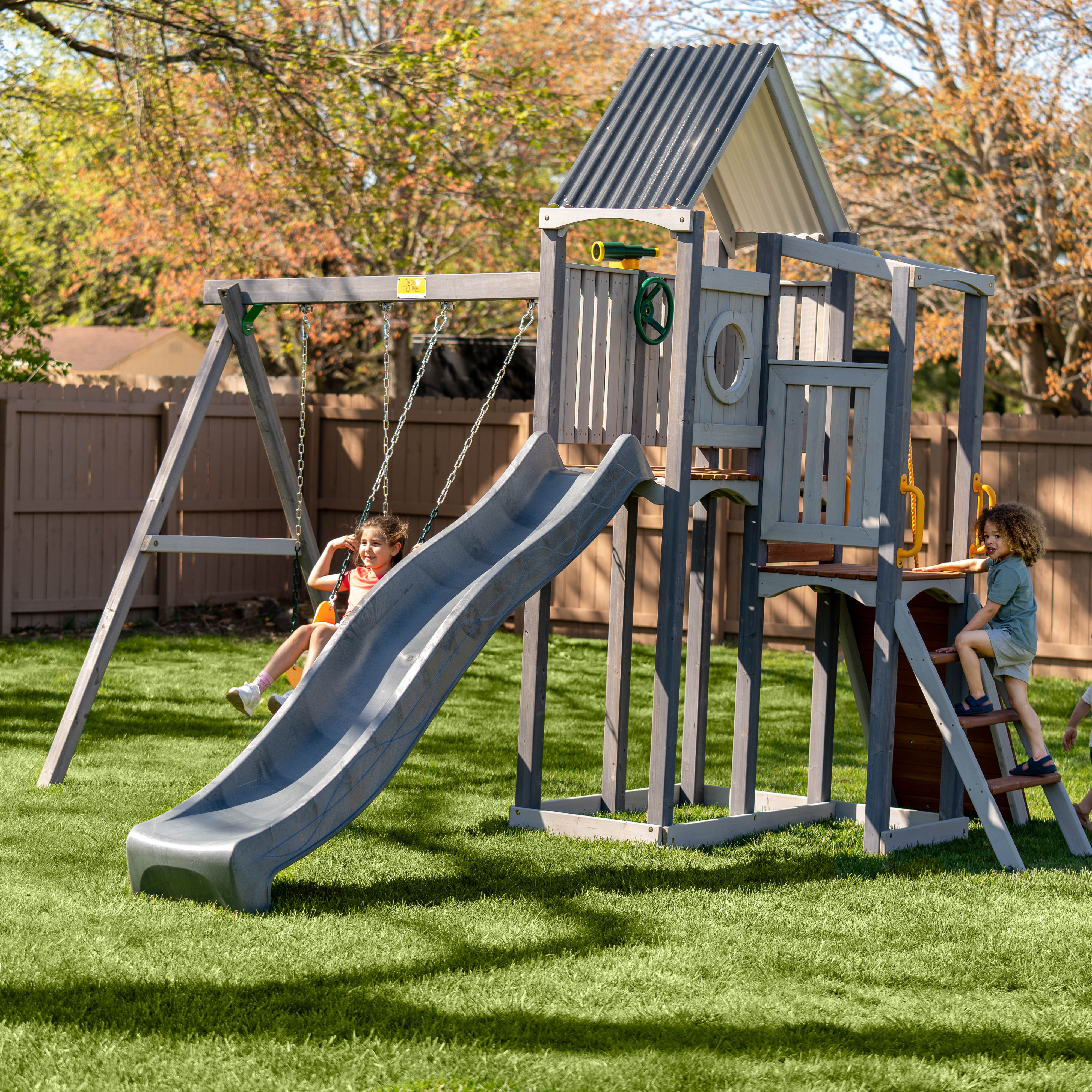 backyard playhouse swing set