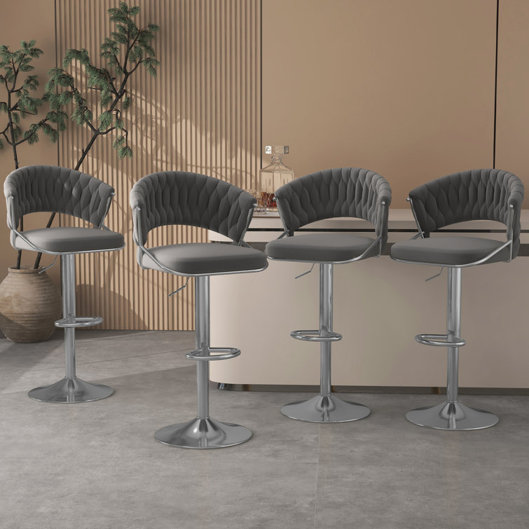 Everly Quinn Christal Swivel Upholstered Adjustable Height Counter ...