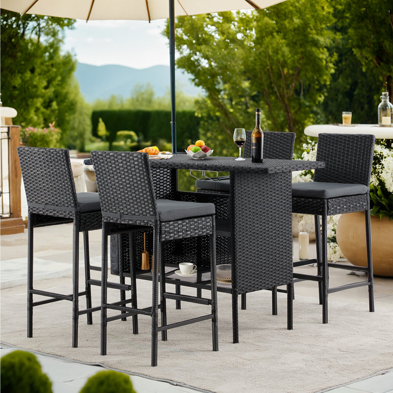Arlmont & Co. Wicker Bar Set with 4 Stools & Outdoor Bar Table ...