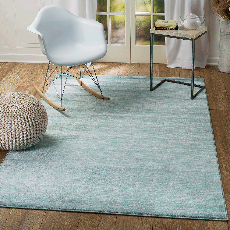 Hitton Turquoise Area Rug
