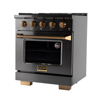 black oven with gold knobs