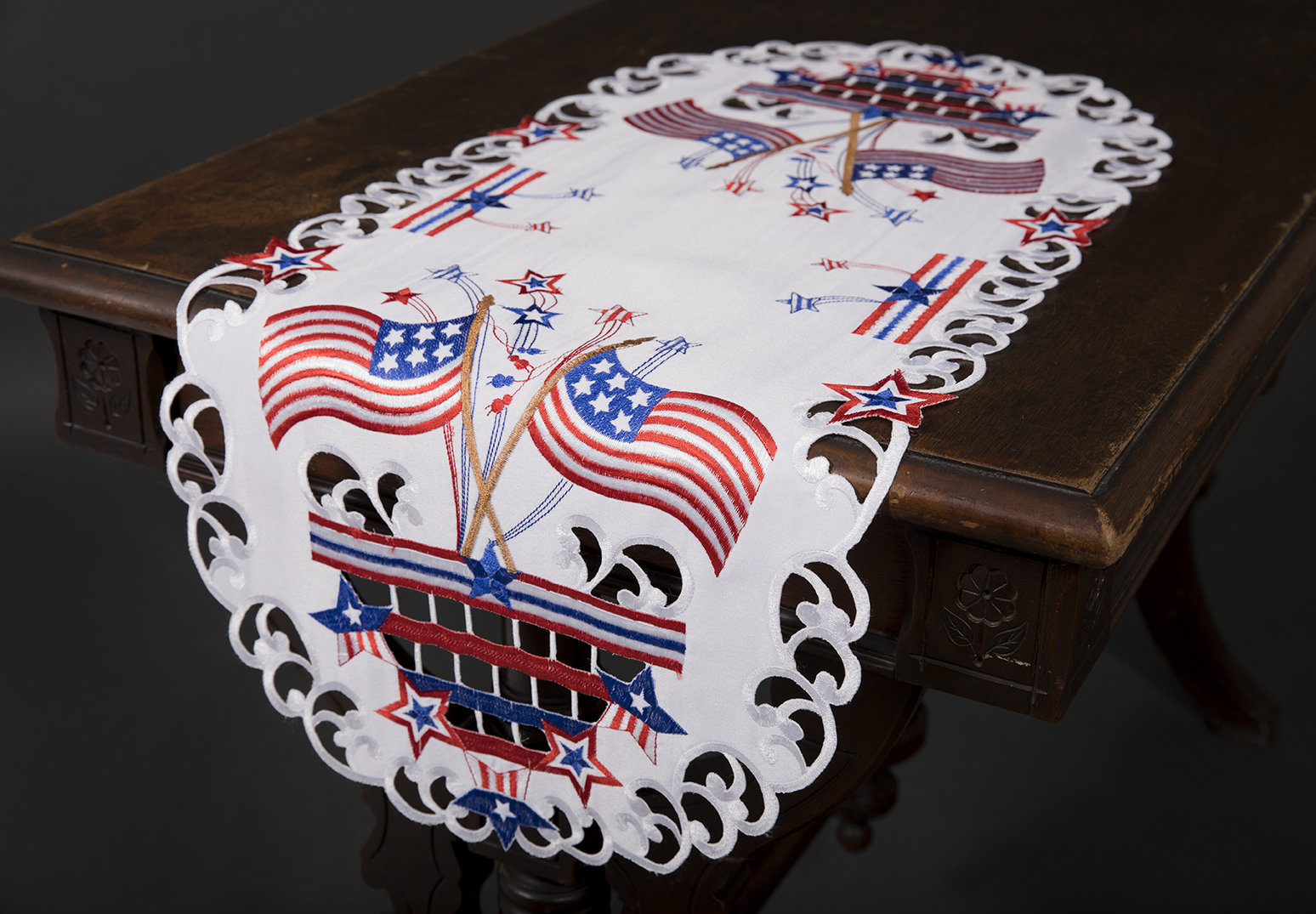 The Holiday Aisle® Star Spangled Embroidered Cutwork Table Runner ...