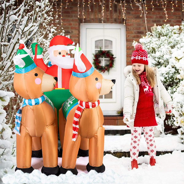 The Holiday Aisle® Emila Christmas Inflatable Santa on Sleigh with ...