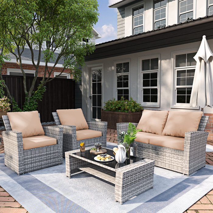 Winston Porter Thaddeus 4 - Person Outdoor Seating Group with Cushions ...