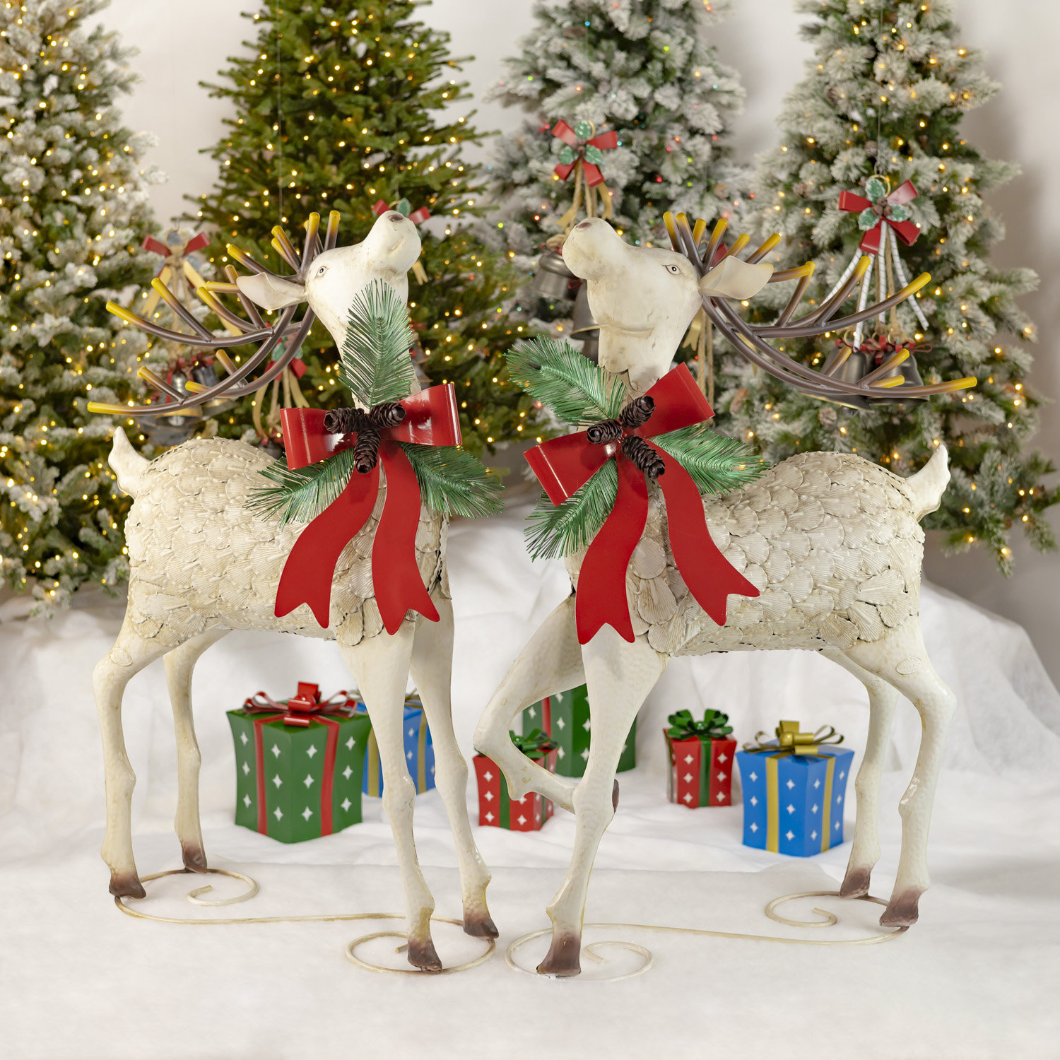 The Holiday Aisle® 2 Piece Iron Reindeer with Pinecone Bow Decorative ...