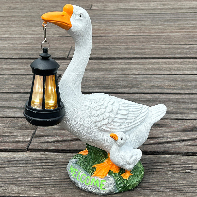 Ophelia & Co. 12-Inch Outdoor Garden Goose Statue With Lantern | Wayfair