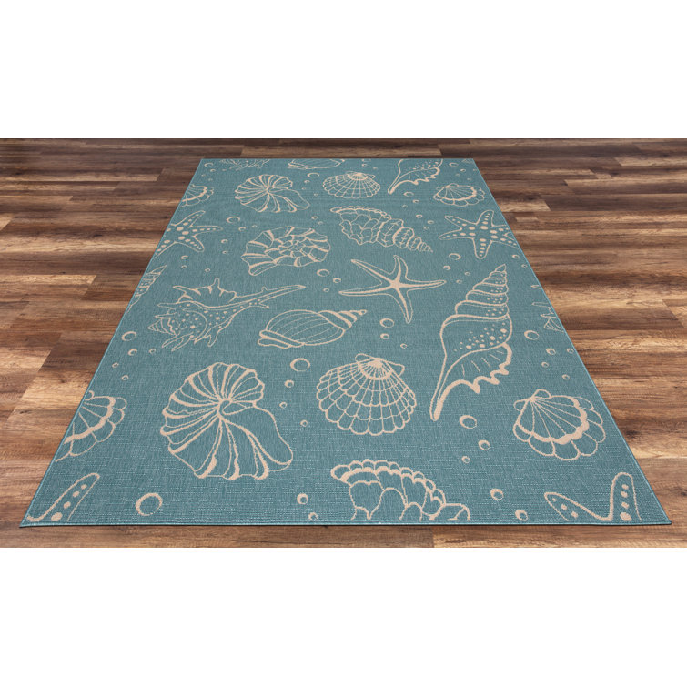 Highland Dunes Hollar Shells Medium Blue Indoor/Outdoor Area Rug ...