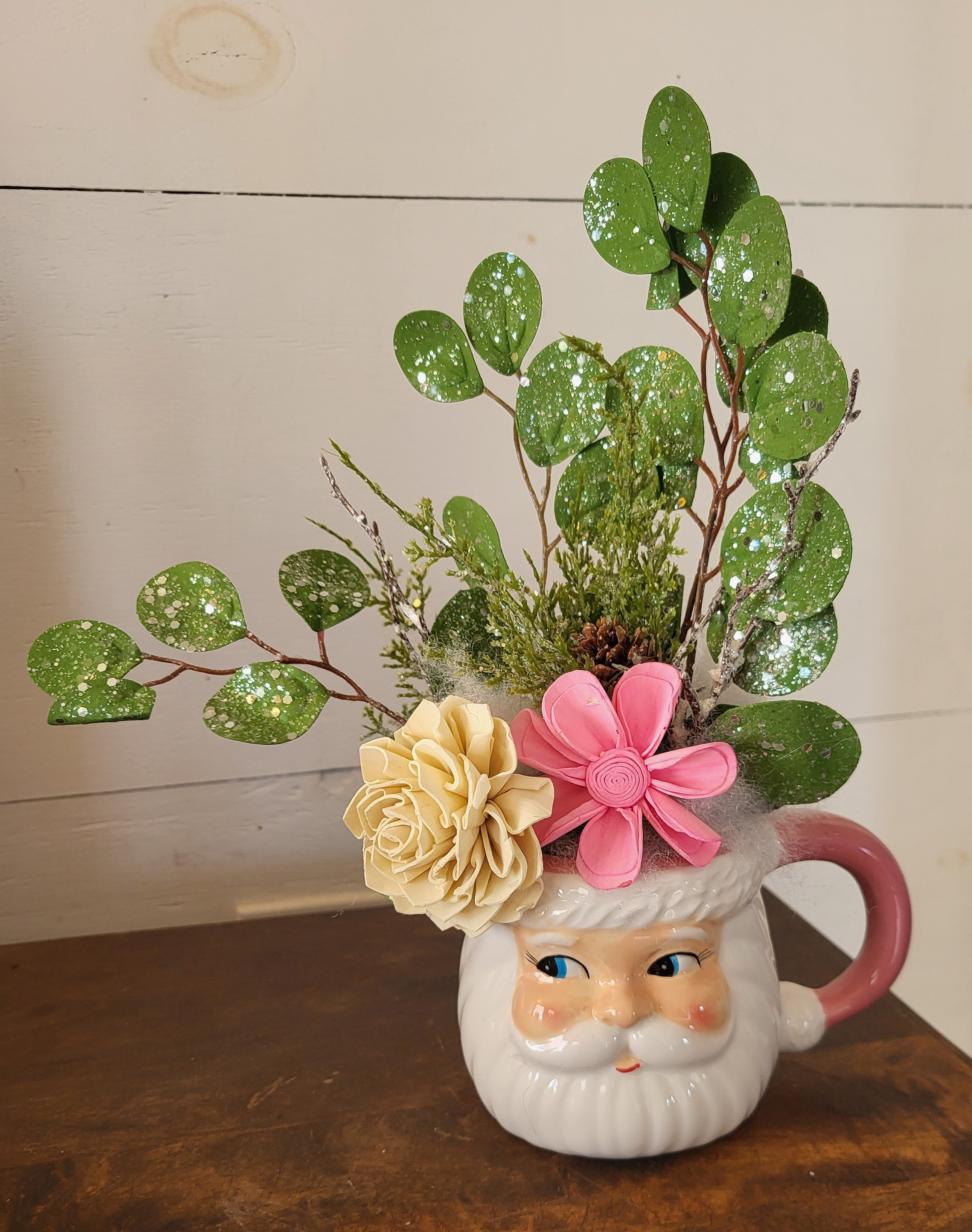 Primrue Pink Santa Cup Floral Arrangement | Wayfair