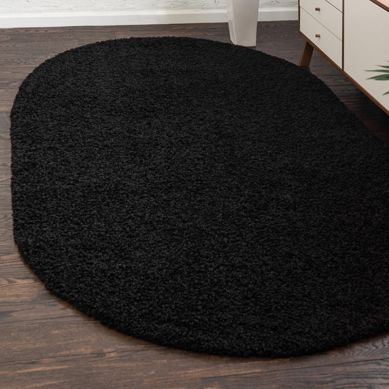 Ebern Designs Santoshi Performance Jet Black Rug & Reviews | Wayfair