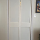 Trimlite Primed 2 Panel Shaker Bi-Fold Door & Reviews | Wayfair